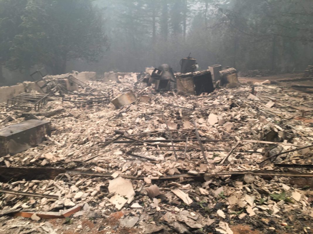 Owners of Vida Cafe and Family of 8 Lose Their Home to Holiday Farm Fire